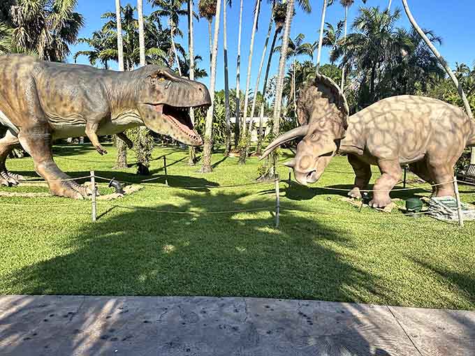 Life-sized dinosaur sculptures remind visitors that these plants have been around since the Jurassic period, outlasting every trend.