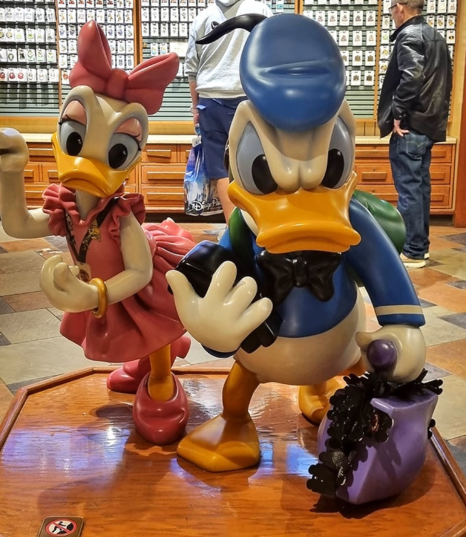 Donald and Daisy Duck stand guard over the sweet treasures, their expressions perfectly capturing Disney's blend of mischief and charm.