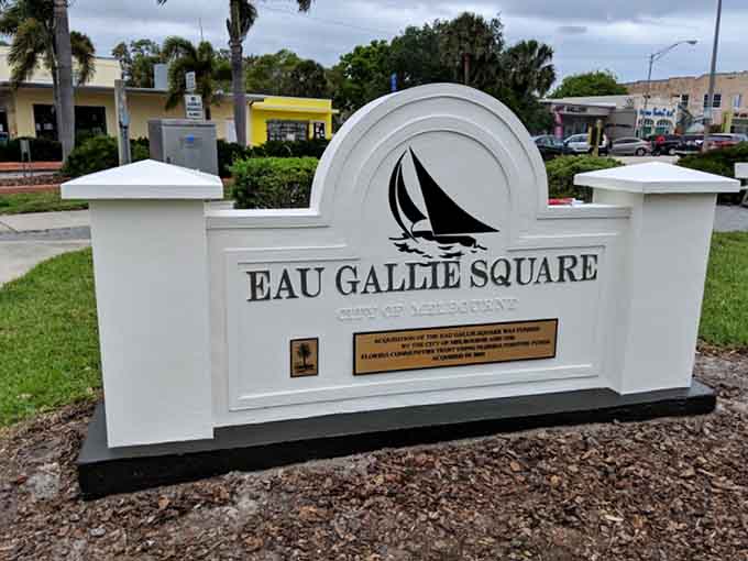 The Eau Gallie Square sign welcomes you with a sailboat logo, because even the signage here has more personality than most places.