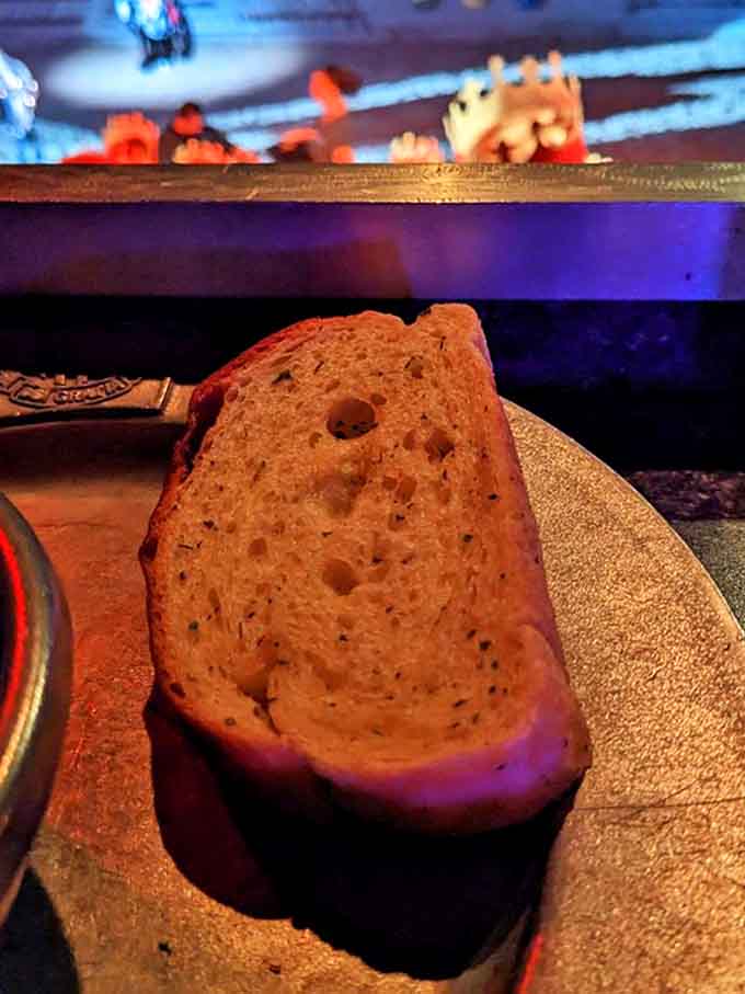 The herb-infused castle bread arrives warm and ready for tearing &ndash; a carb-loaded prelude to the main event that somehow tastes better when eaten like a medieval peasant.