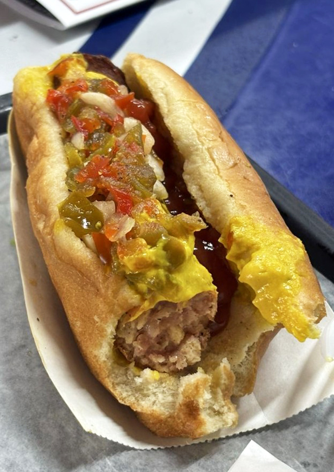 The legendary Gator Dog &ndash; where Florida meets fast food &ndash; topped with their famous "swamp relish" that makes exotic taste comfortingly familiar.