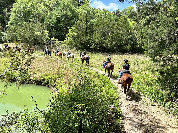 Friends form a horseback caravan through meadows and forests, each bend in the trail revealing another postcard-worthy vista.