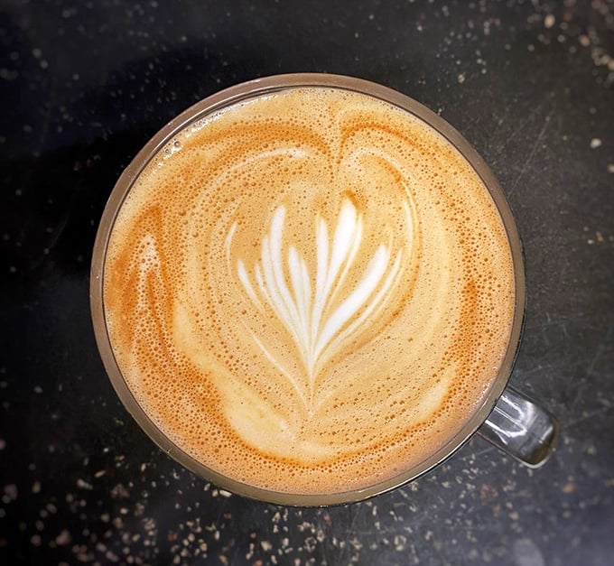 Perfectly crafted latte, promising warmth and comfort with every sip of the velvety concoction.