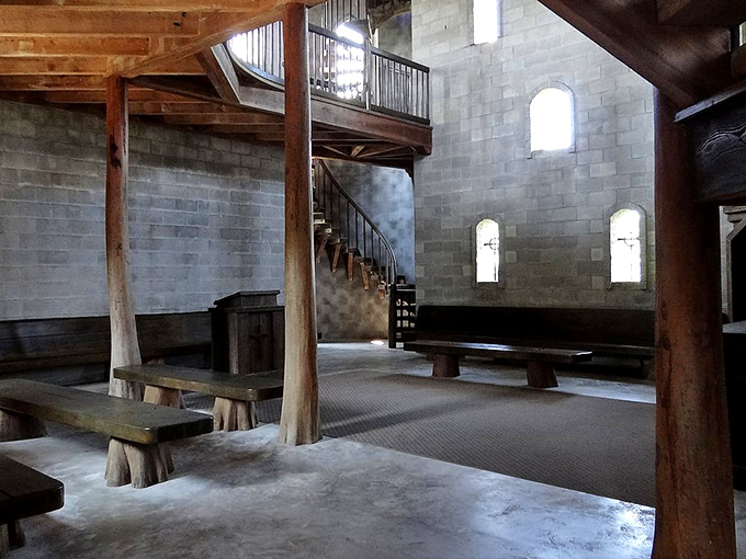 Inside, wooden beams and stone walls create the kind of authentic atmosphere that makes you instinctively lower your voice and wonder where the monks are hiding.