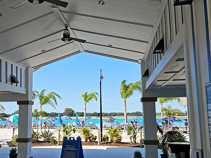 Looking out from the shaded comfort of the entrance pavilion, visitors get their first glimpse of the impossibly blue waters beyond.