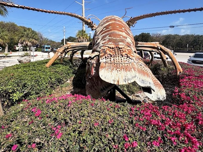 Lobster tail: Betsy's magnificent tail curves dramatically skyward, showcasing the incredible attention to anatomical detail in this oversized roadside wonder.