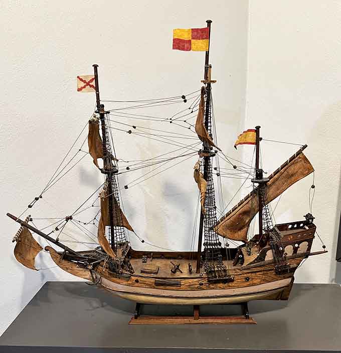 Intricate ship models showcase the vessels that carried fortunes across treacherous seas, their miniature rigging a testament to maritime craftsmanship.