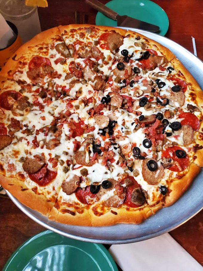 This isn't just any meat lover's dream &ndash; it's a carnivorous masterpiece that would make even ghosts materialize for a slice.