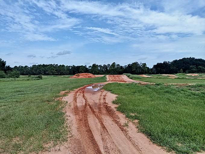 Nature's rollercoaster: the motocross track rises from the landscape, offering challenges that separate the casual riders from the truly committed.