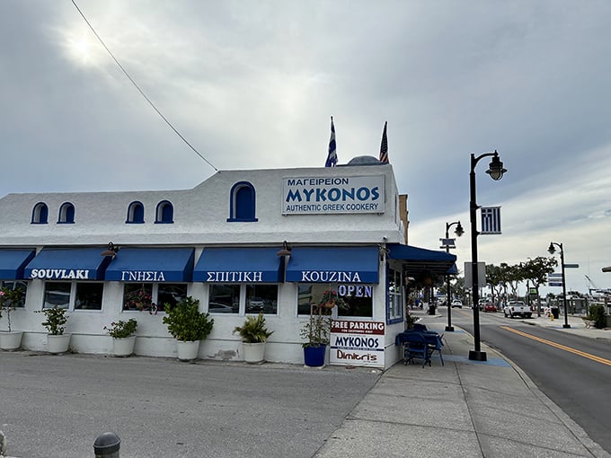 Mykonos Restaurant's blue awnings and Greek lettering aren't just decoration&mdash;they're a portal to authentic Mediterranean flavors.