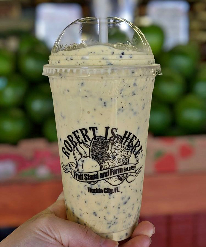 This creamy concoction, speckled with seeds like tiny flavor bombs, delivers tropical bliss with every sip.