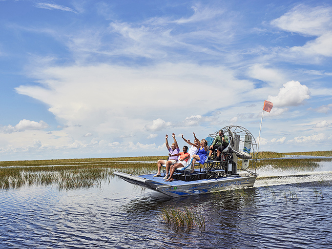 Nothing says "Florida adventure" like perching on an airboat with friends, wondering which wildlife will make an appearance first.