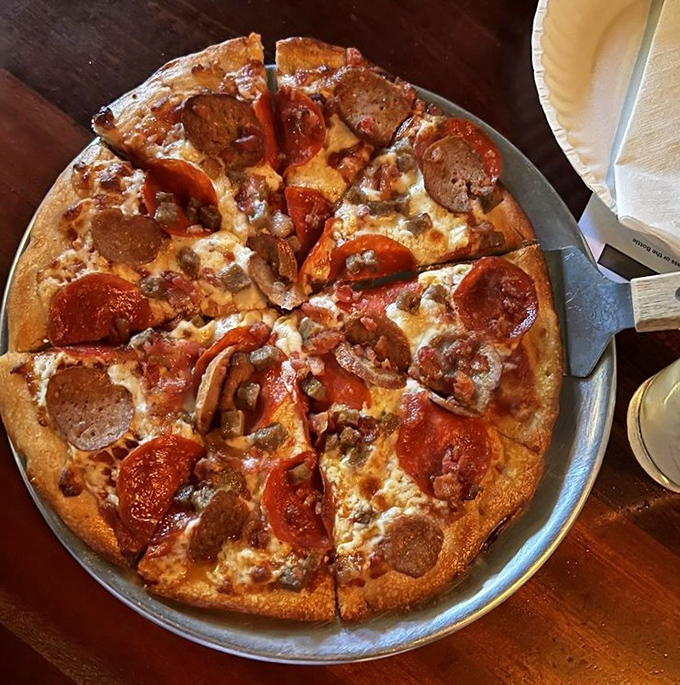 The carnivore's dream &ndash; pepperoni and sausage playing perfectly together on a canvas of melted cheese.