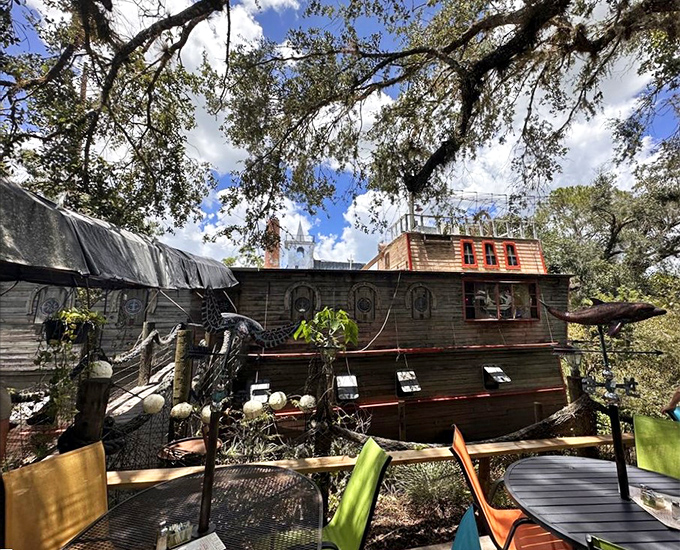 A wooden bridge invites visitors across the moat, promising adventures that Walt Disney never imagined in his wildest fantasies.