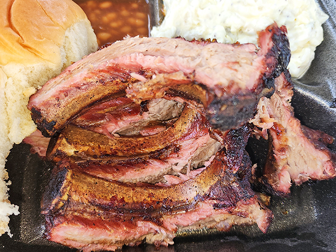 These aren't just ribs; they're edible poetry with a smoke ring that would make pitmasters weep with joy.