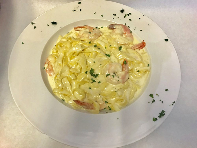 Shrimp Fettuccine Alfredo that makes you want to write poetry &ndash; plump crustaceans nestled in ribbons of pasta coated with silky, parmesan-rich sauce.