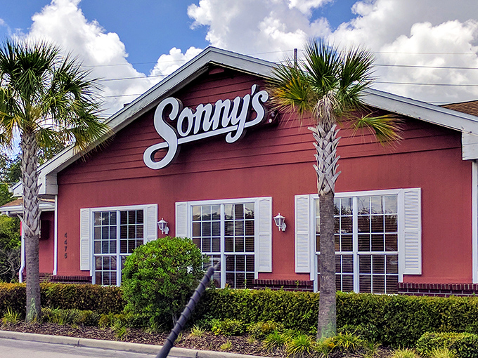 The bright red building promises smoky delights inside &ndash; ribs so tender they practically surrender before your first bite. 