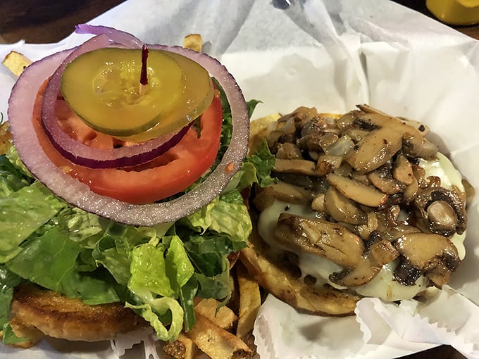 Behold the star of the show &ndash; a perfectly seasoned patty embraced by melted Swiss cheese and crowned with saut&eacute;ed mushrooms. Poetry on a bun.