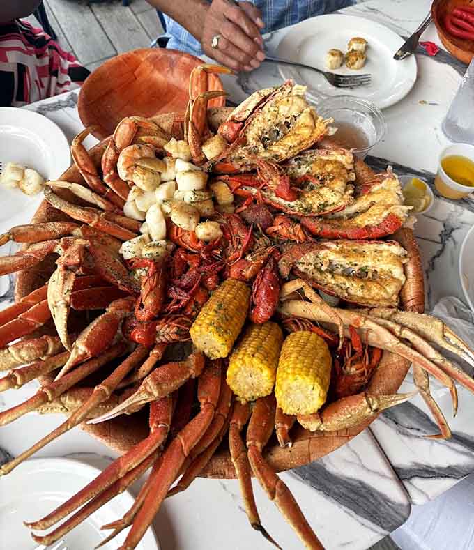 Behold the garlic crab mountain: messy, magnificent, and absolutely worth every napkin you'll go through getting to the meat.
