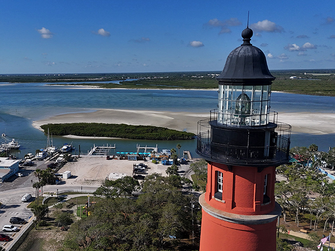 From the lighthouse gallery, the Atlantic stretches endlessly, meeting the Intracoastal Waterway in a stunning display of Florida's natural beauty.