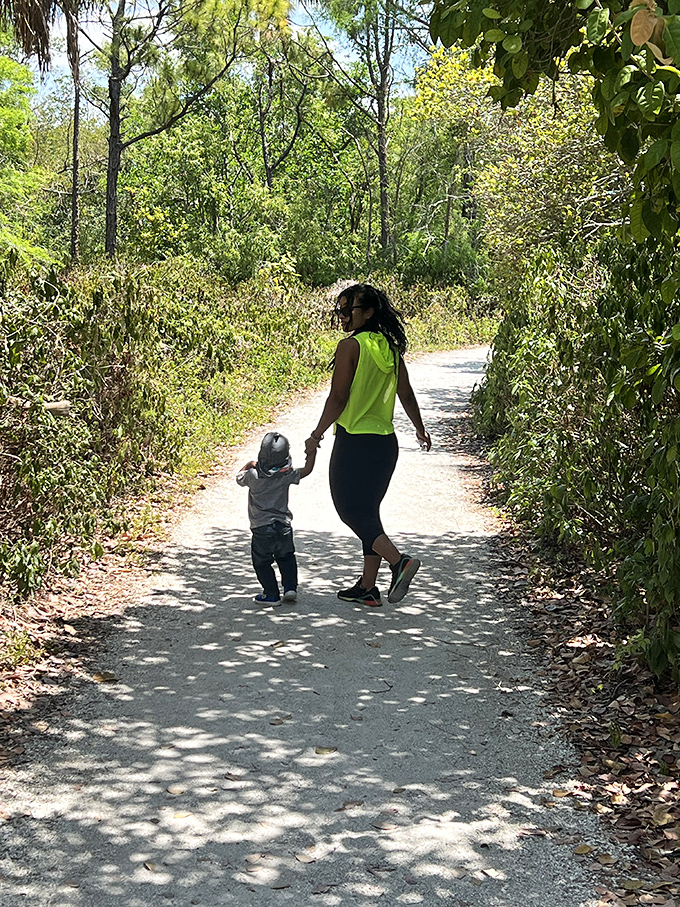 Families find joy in sharing nature's wonders with the next generation – no screens required for this kind of entertainment!