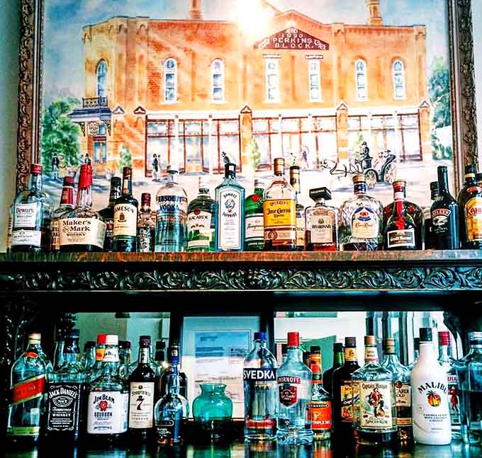 Behind the bar, spirits line up before a painting of the opera house itself &ndash; meta-drinking at its finest!