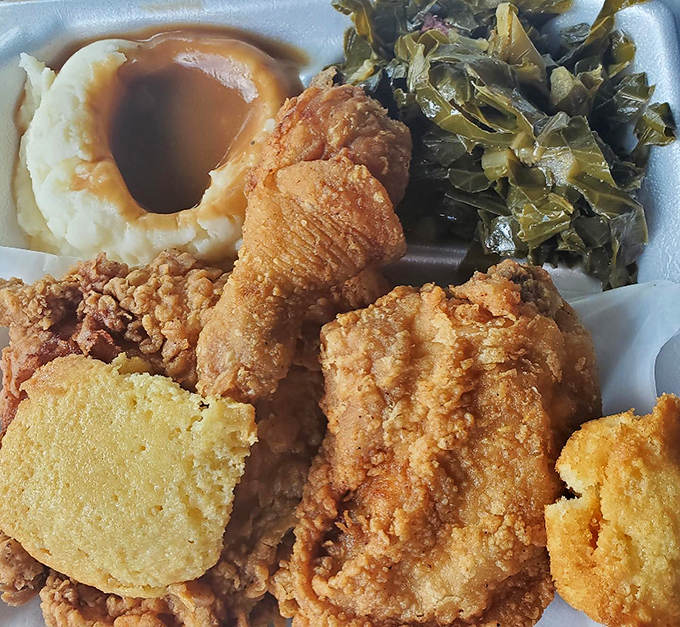 Crispy, juicy fried chicken alongside collards that have simmered their way to perfection &ndash; a match made in Southern heaven.