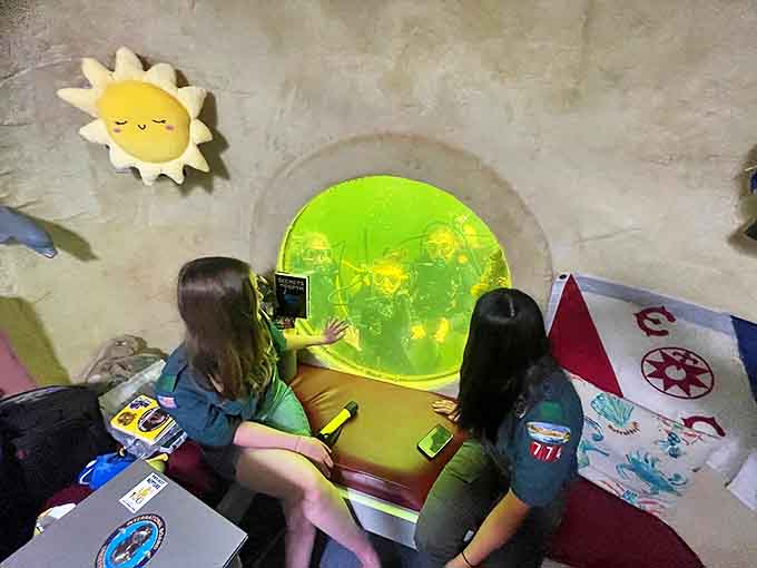 Staff members prepare divers for their underwater adventure, ensuring safety while maintaining the excitement of this unique experience.