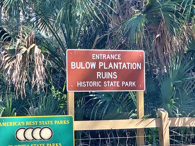 The entrance sign welcomes modern explorers to Bulow's domain, where history waits patiently beneath a canopy of whispering palms.