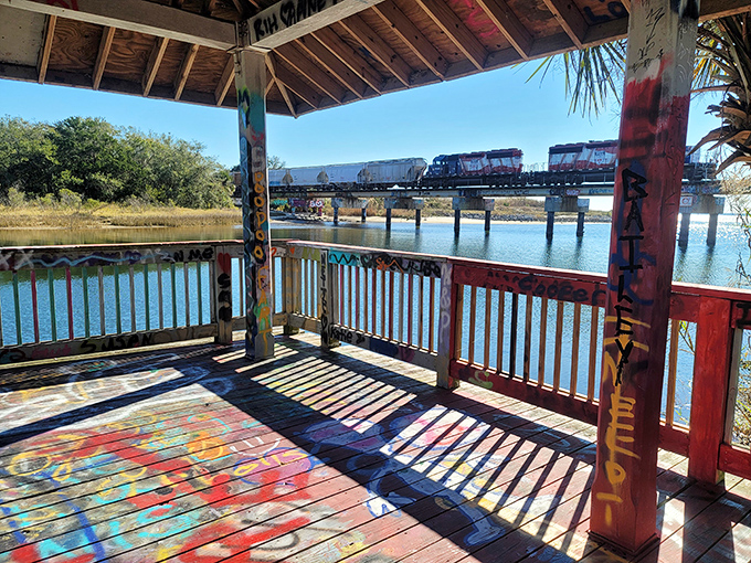 The covered pavilion offers shade and perspective, perfect for contemplating the ever-changing masterpiece surrounding you.