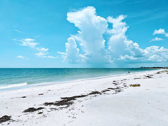 Powdery perfection meets Gulf waters in a dance as old as time, where footprints disappear with each gentle tide.