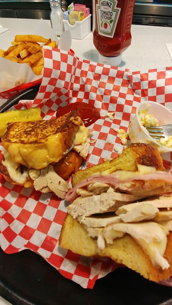 This isn't just a sandwich&mdash;it's an architectural marvel of melted cheese, perfectly grilled bread, and fillings stacked with the ambition of a Florida skyscraper.