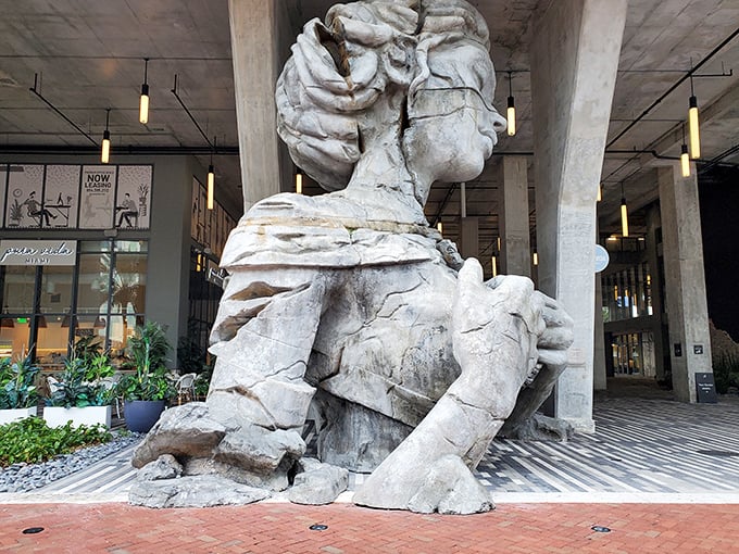 From this angle, you can appreciate how the artist captured both strength and vulnerability, the figure simultaneously powerful and exposed.