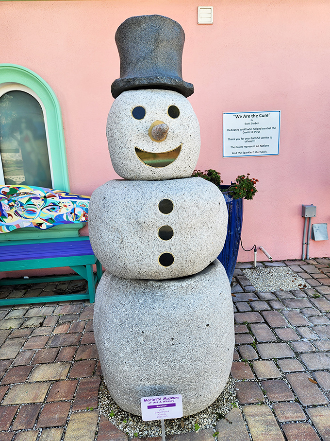 Florida's most weather-defiant resident: a stone snowman who laughs in the face of 90-degree heat and 100% humidity.