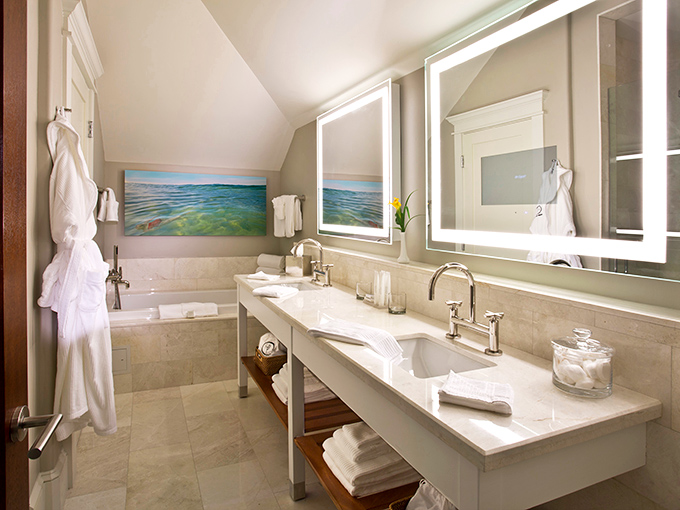 Bathroom bliss awaits with gleaming marble surfaces and lighting that flatters even on your worst hair days.