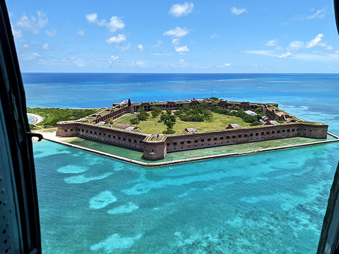 From above, Fort Jefferson resembles a massive floating hexagon, its geometric precision a stark contrast to the organic beauty of surrounding reefs and sandbars.