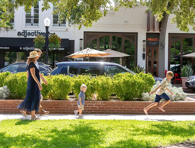 Family strolls are a daily ritual in Winter Park, where pedestrian-friendly streets encourage exploration at a leisurely pace.