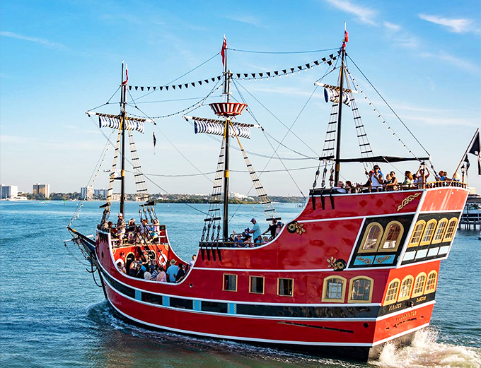 Captain Memo's bright red ship makes a bold statement against Clearwater's turquoise waters &ndash; like a cardinal soaring over a tropical paradise.