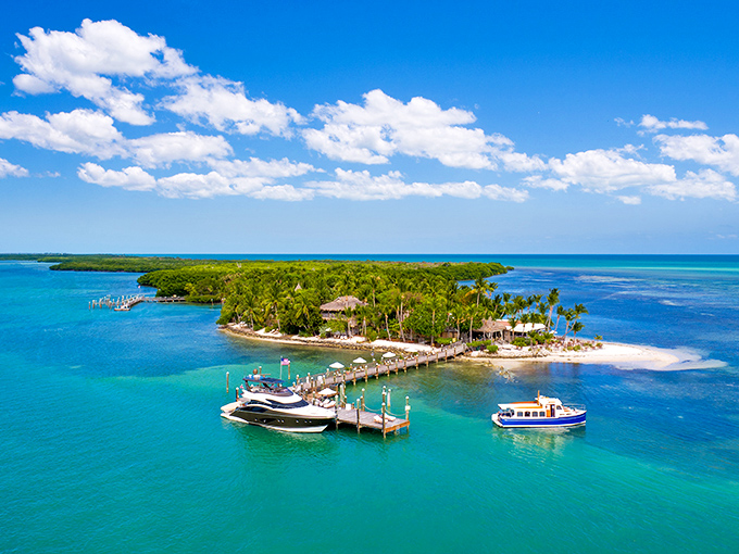 Little Palm Island emerges from the turquoise waters like nature's perfect screensaver. This exclusive Florida Keys retreat is where Robinson Crusoe would vacation if he won the lottery.