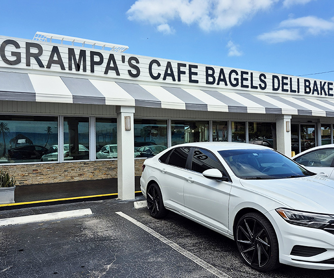 Bright Florida sunshine highlights Grampa's charming exterior, where locals have gathered for decades for authentic deli favorites.