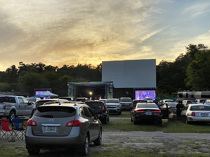 Dusk settles over the Joy-Lan Drive-In as cars find their spots, headlights dimmed in anticipation of the coming show.