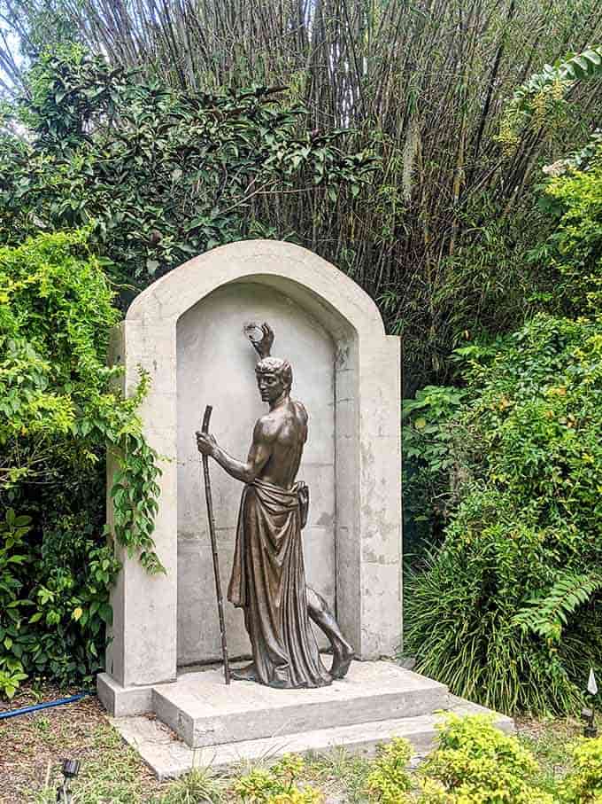 A pilgrim pauses at the threshold between worlds, captured in bronze with haunting, contemplative beauty that stops you cold.