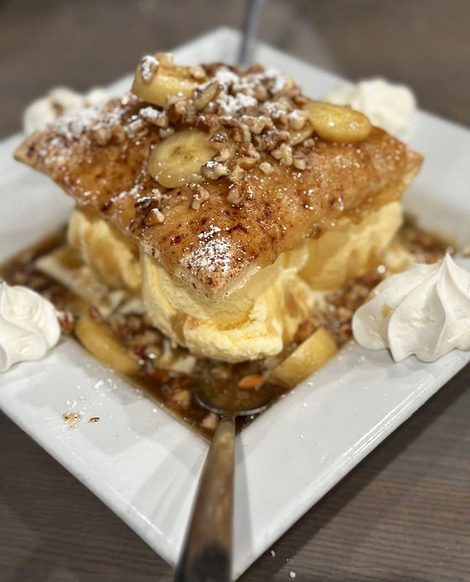 A closer look at dessert perfection: warm pastry, cool ice cream, caramelized bananas, and pecans creating a symphony of textures and flavors.