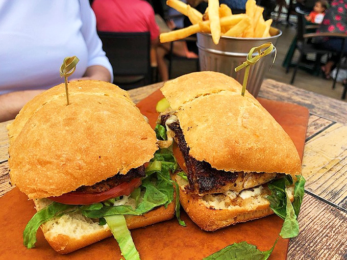 A work of culinary art: the blackened Mahi sandwich with golden fries makes for the quintessential Florida lunch experience.