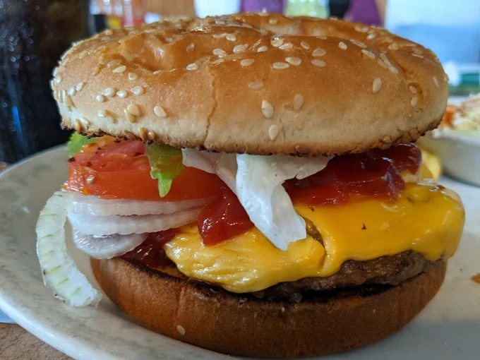 This isn't one of those fancy $20 gourmet burgers &ndash; it's an honest, hand-formed patty with all the fixings that requires multiple napkins.