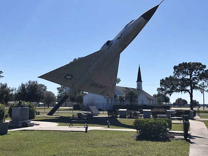 Fighter jets stand guard like metallic sentinels, their sleek profiles representing decades of aviation evolution and aerial superiority.