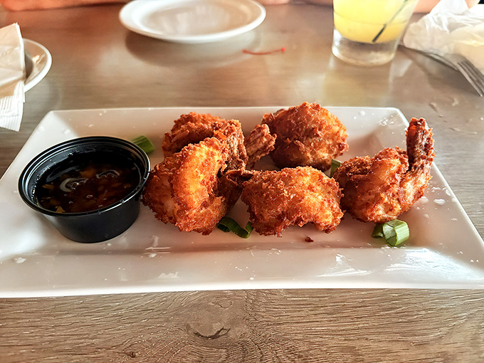 Golden-brown perfection! These coconut shrimp have the ideal crunch-to-tenderness ratio, with a dipping sauce worth bottling and taking home.