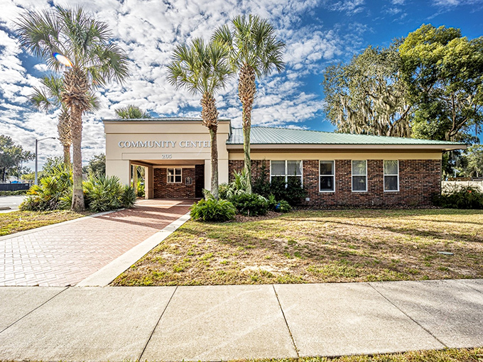 Palm trees stand guard at the Community Center, where potlucks and line dancing classes bring generations together under one roof.