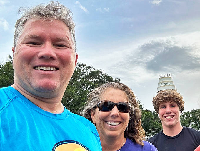 Visitors gather to capture memories with Florida's sweetest landmark towering in the background &ndash; a true "having your cake and seeing it too" moment.