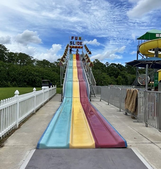 Triple the fun on the colorful Fun Slide, where kids race down in parallel, creating memories as bright as the tracks.